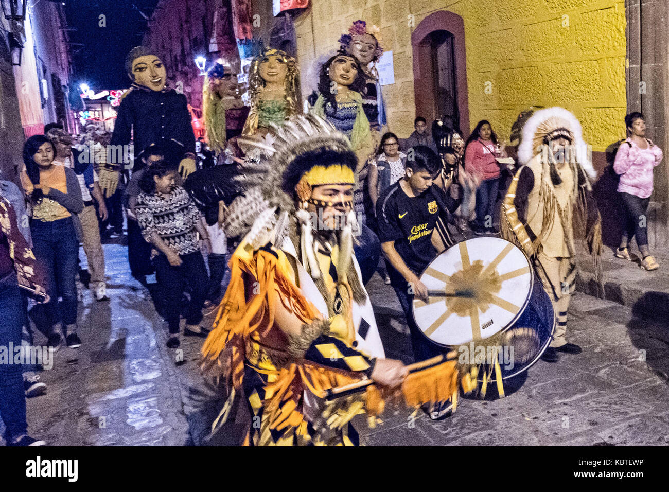 Concheros dancers lead a procession through the historic district ...