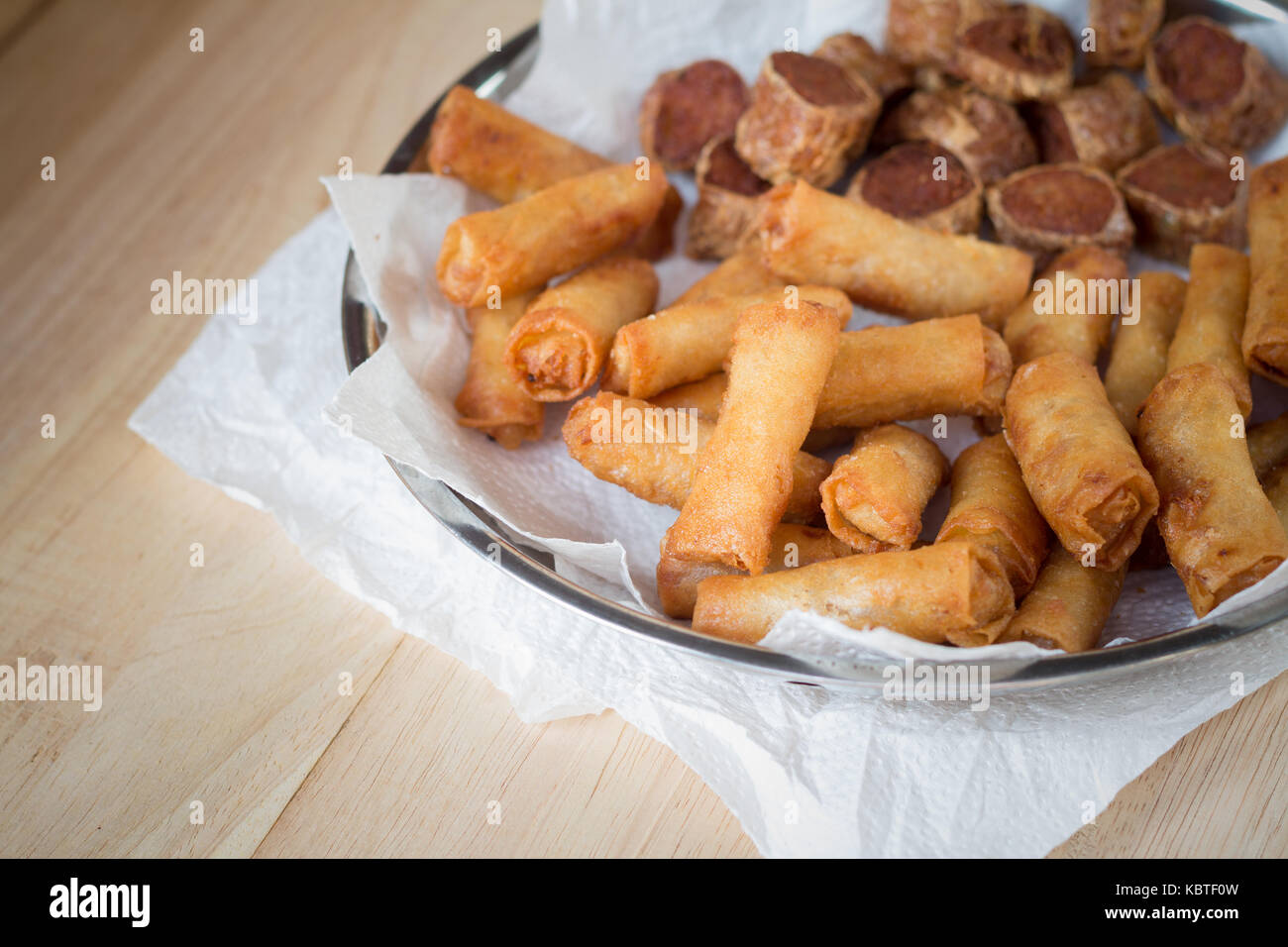 Deep fried spring rolls and deep fried chicken rolls that ready for ...