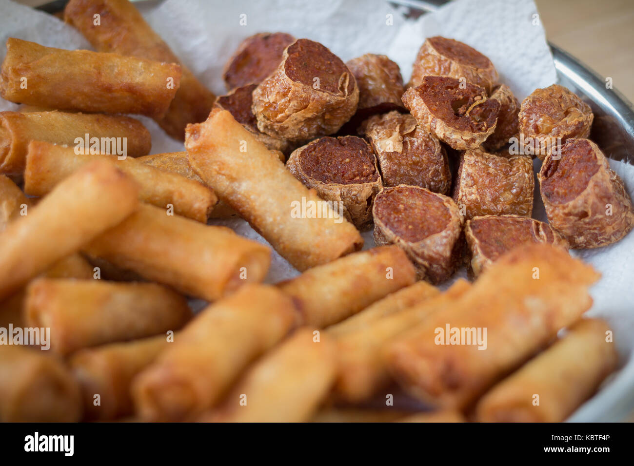Deep fried spring rolls and deep fried chicken rolls that ready for ...