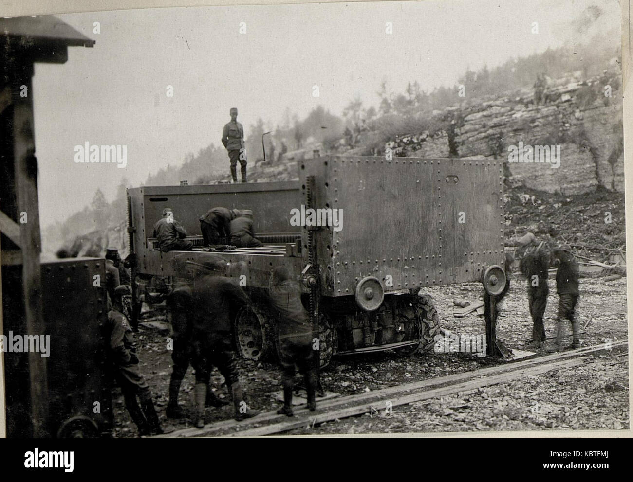 A historical image depicting the mounting of a 42 cm howitzer in ...