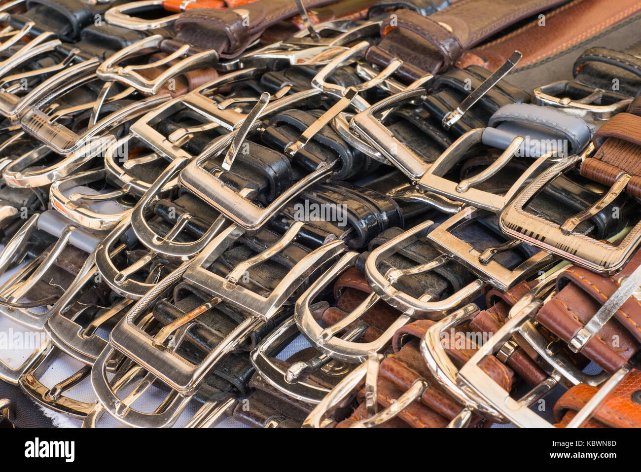 several belt buckles on a table Stock Photo - Alamy