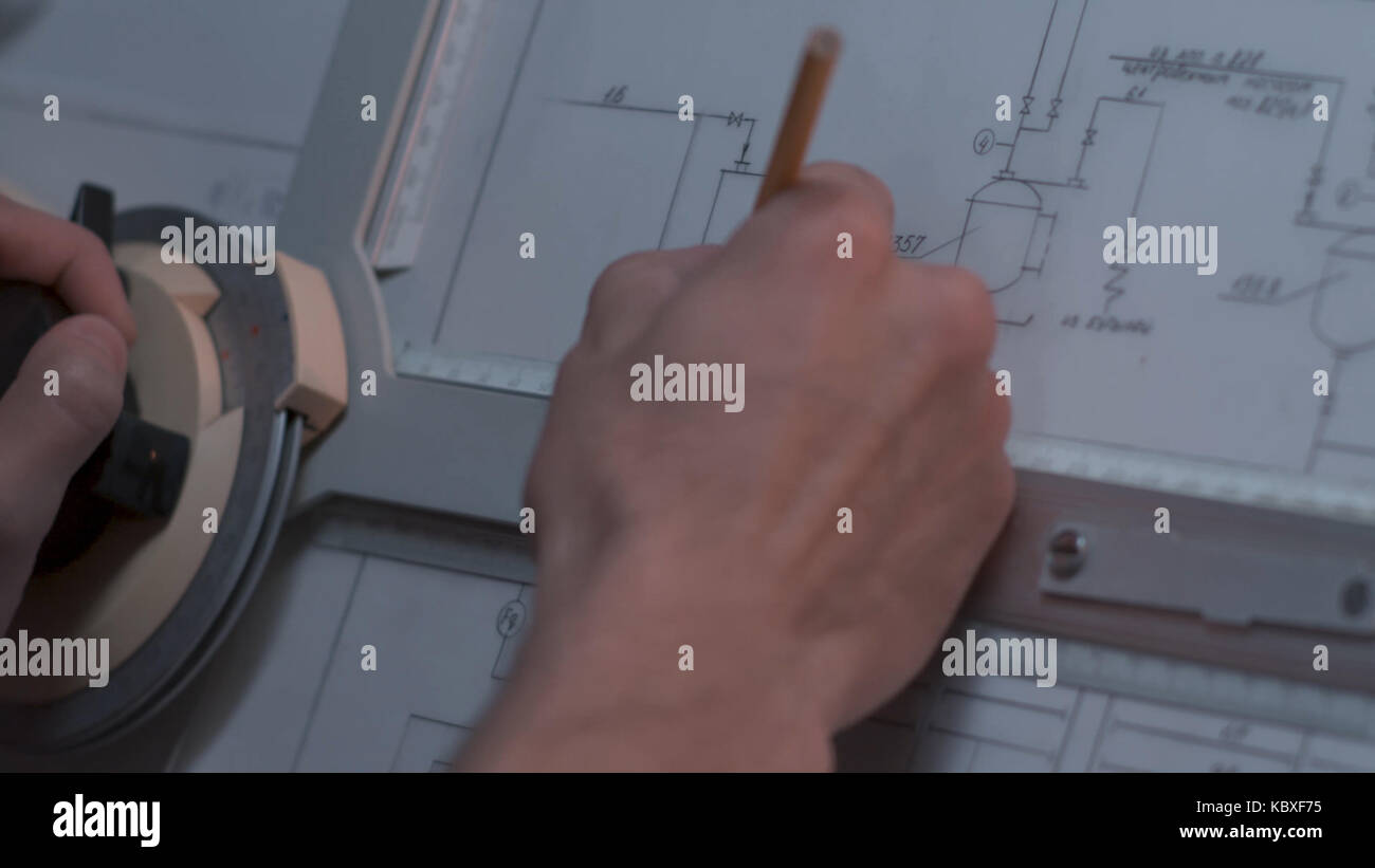 Close up of Architect hand sketching a construction project at work ...