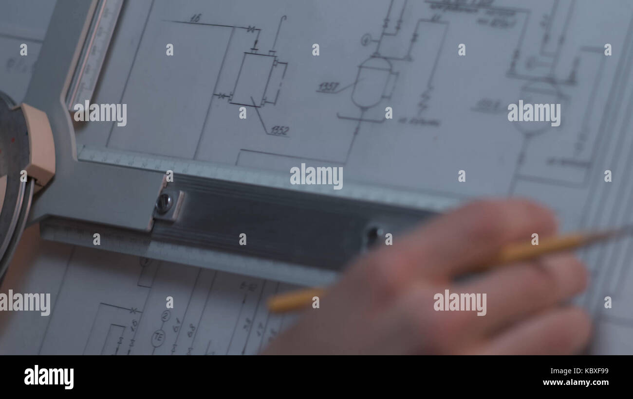 Close up of Architect hand sketching a construction project at work ...