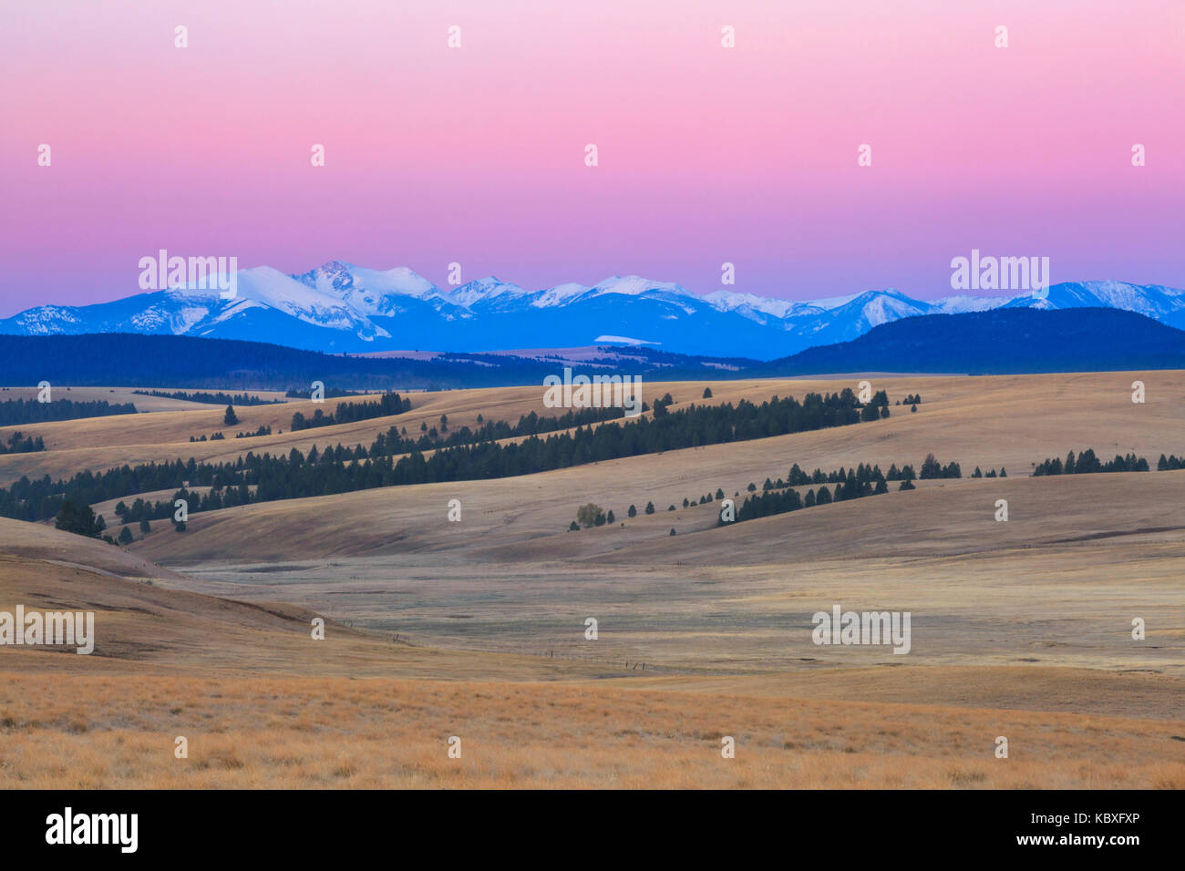 pre-dawn sky over the flint creek range and meadows of the snowshoe ...