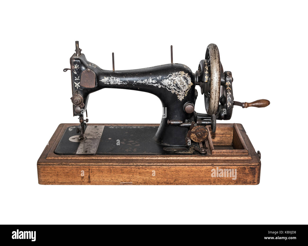 Vintage sewing machine on white background Stock Photo - Alamy
