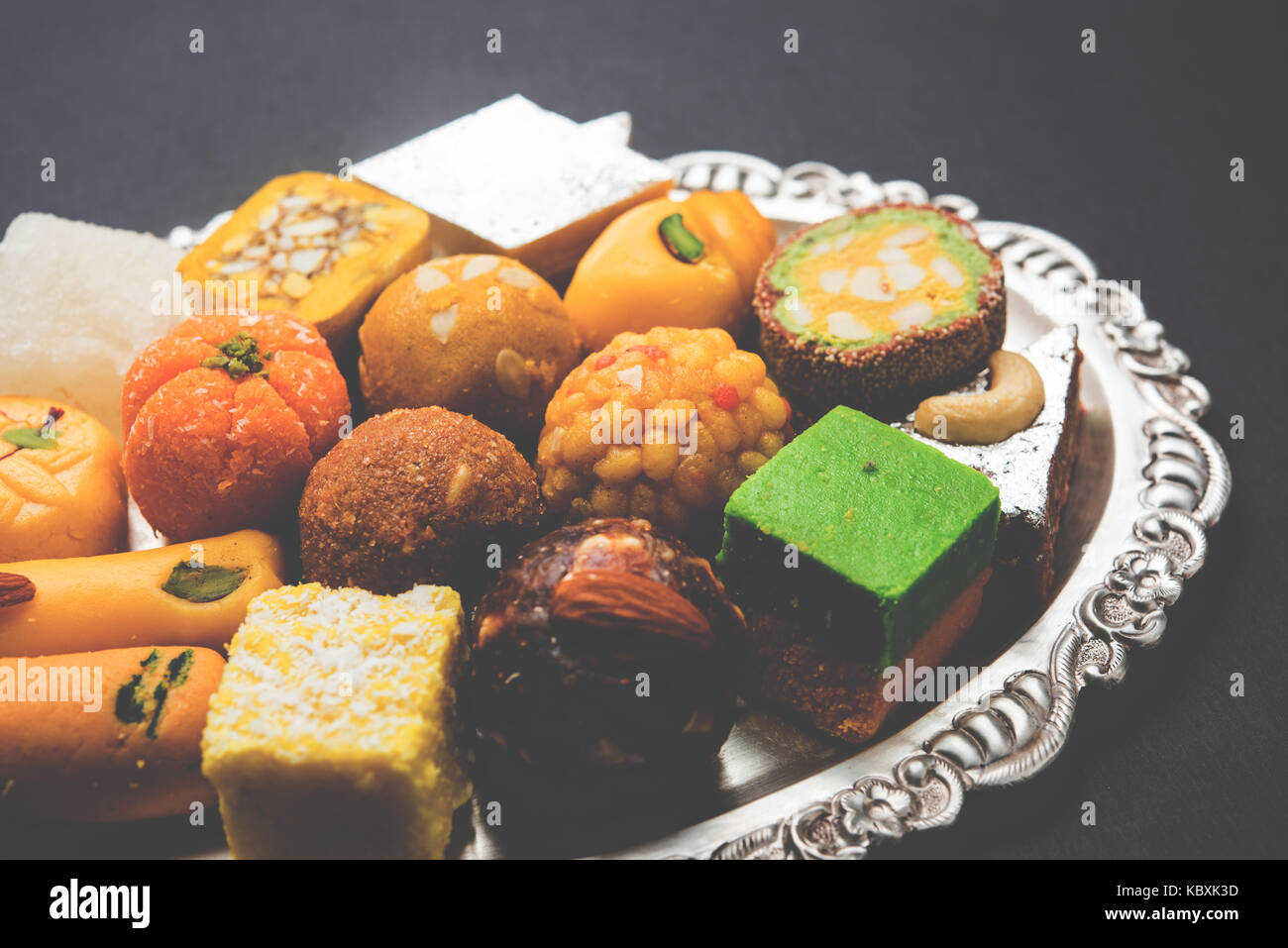 Indian dessert silver plate hi-res stock photography and images - Alamy
