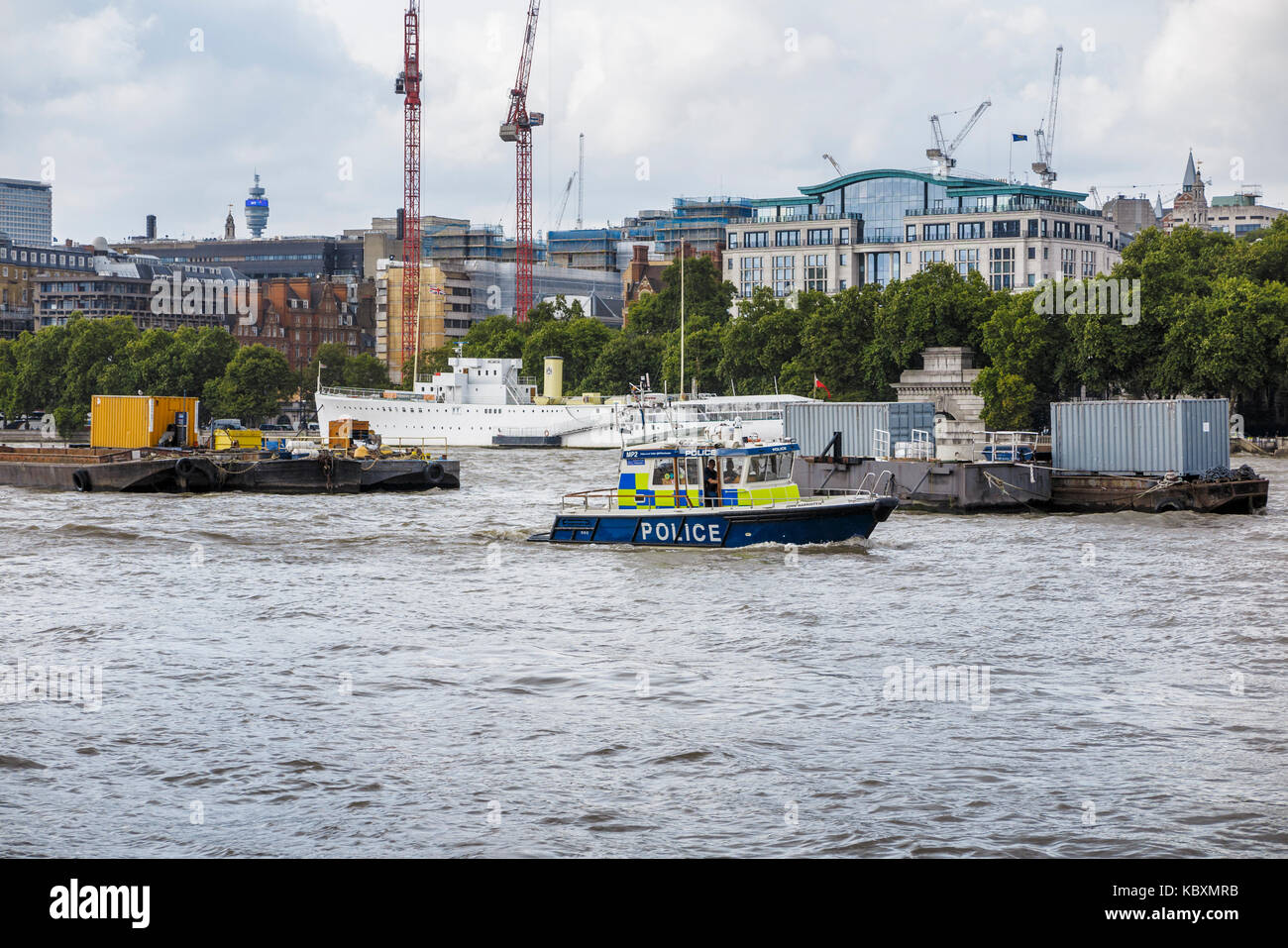 Law enforcement: Metropolitan river police launch sailing on patrol on ...