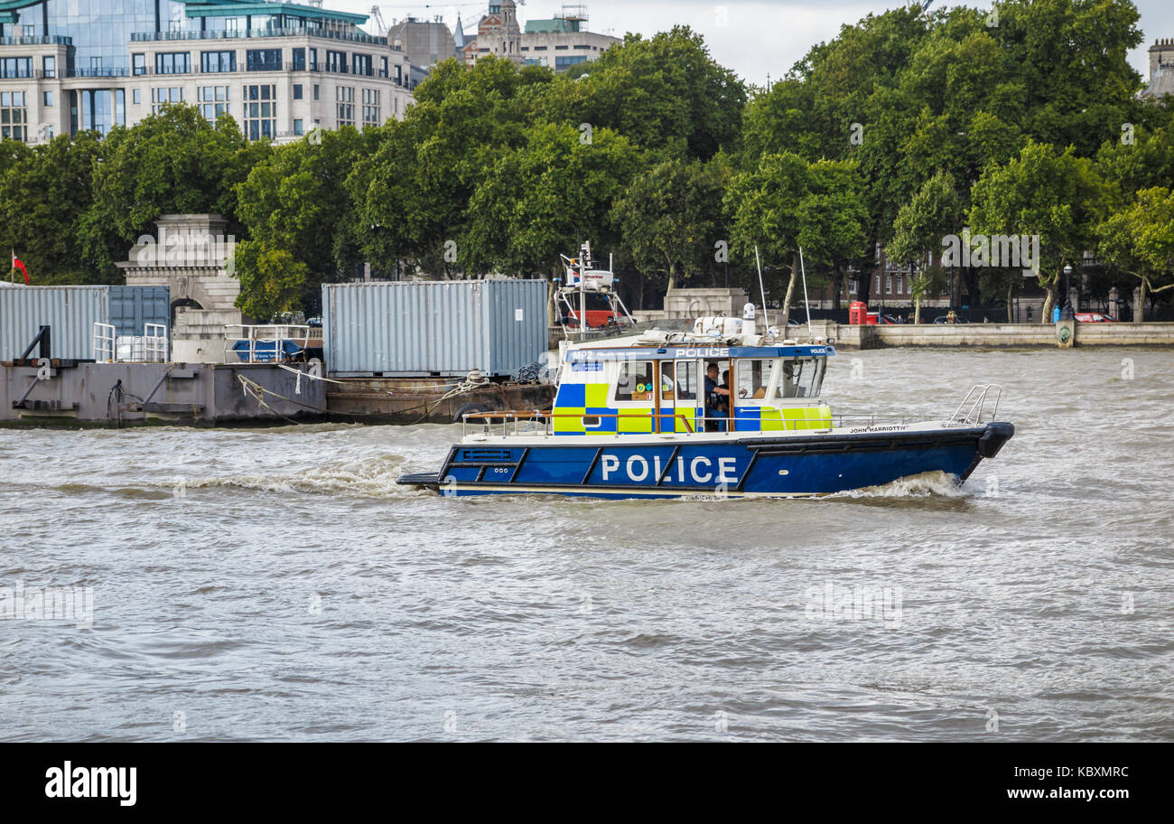 Law enforcement: Metropolitan river police launch sailing on patrol on ...