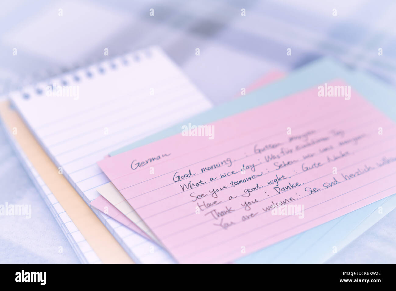 German; Learning New Language Writing Greetings on the Notebook Stock ...