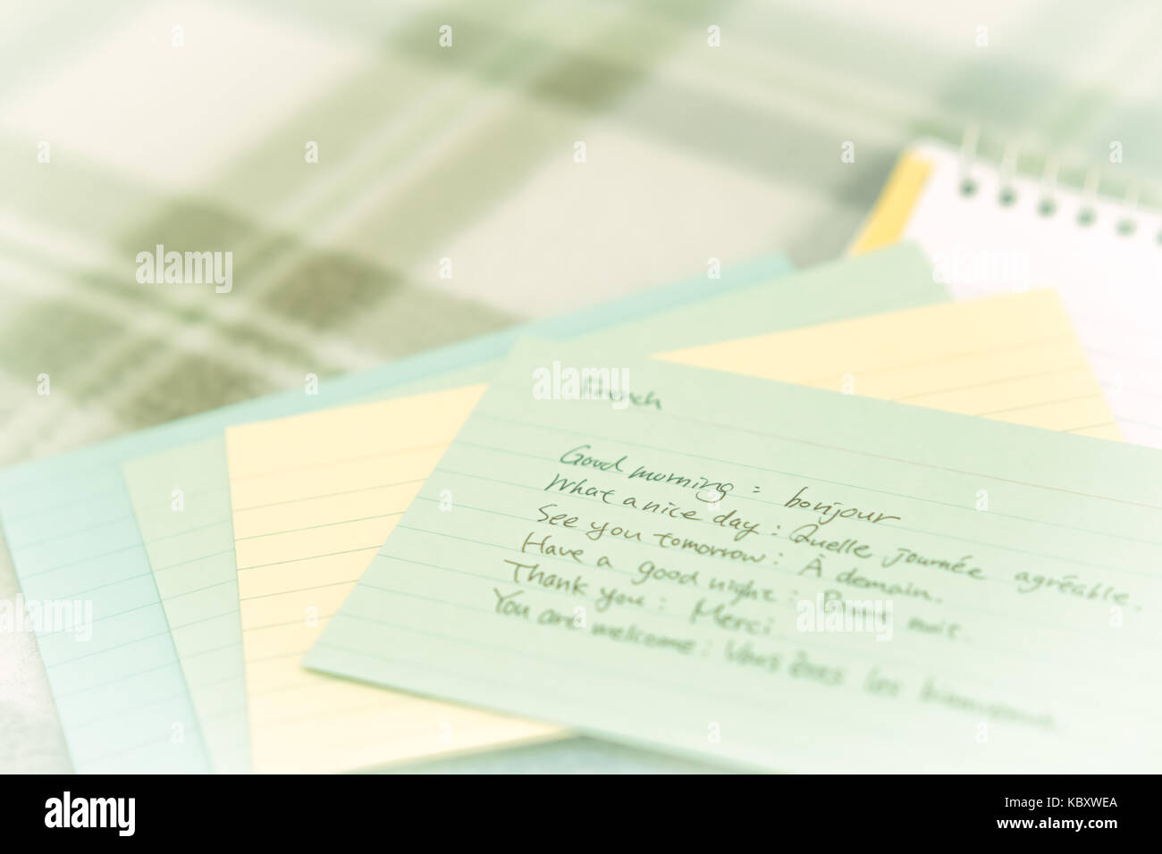 French; Learning New Language Writing Greetings on the Notebook Stock ...