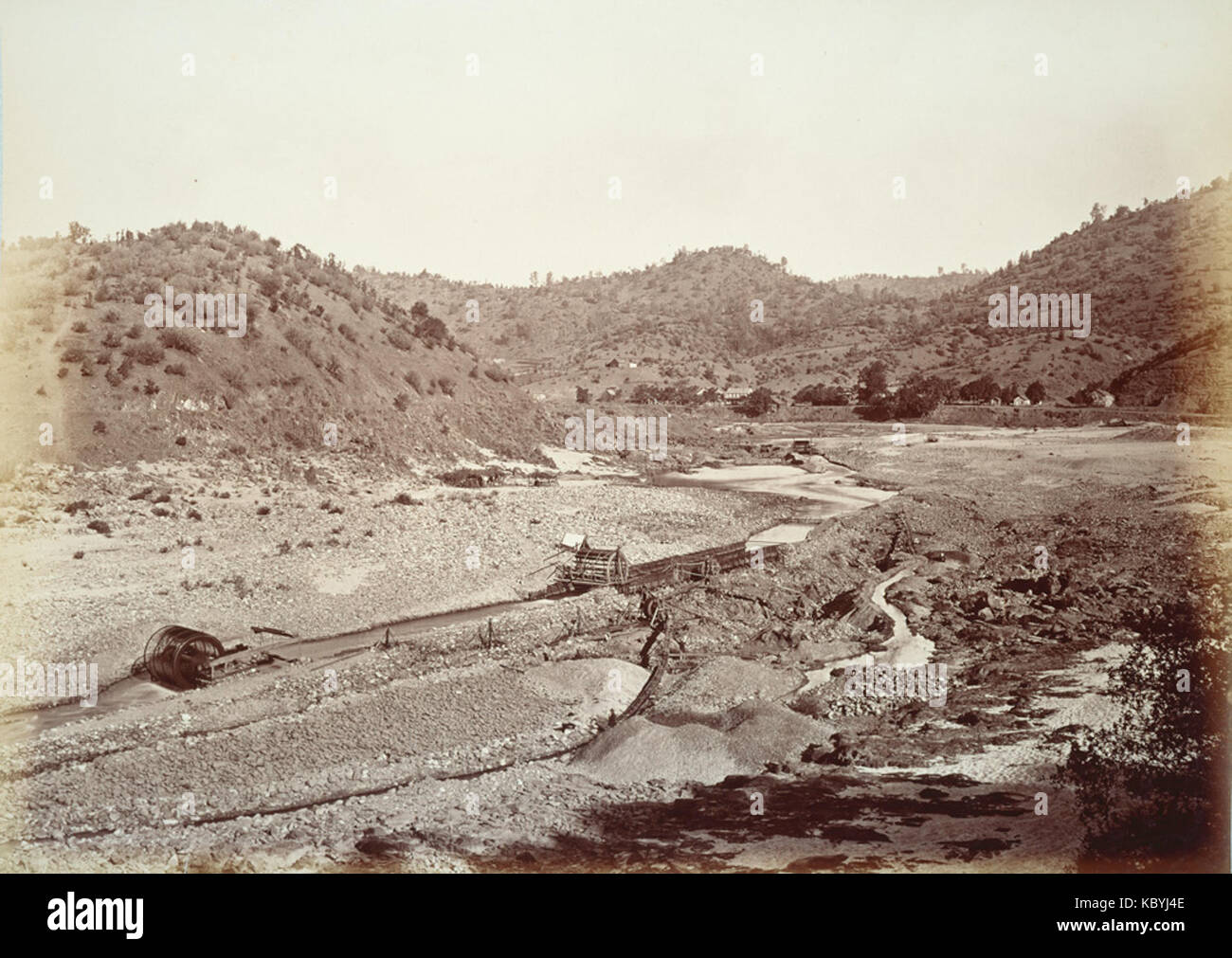 This photograph shows river mining on the Tuolumne River during the ...