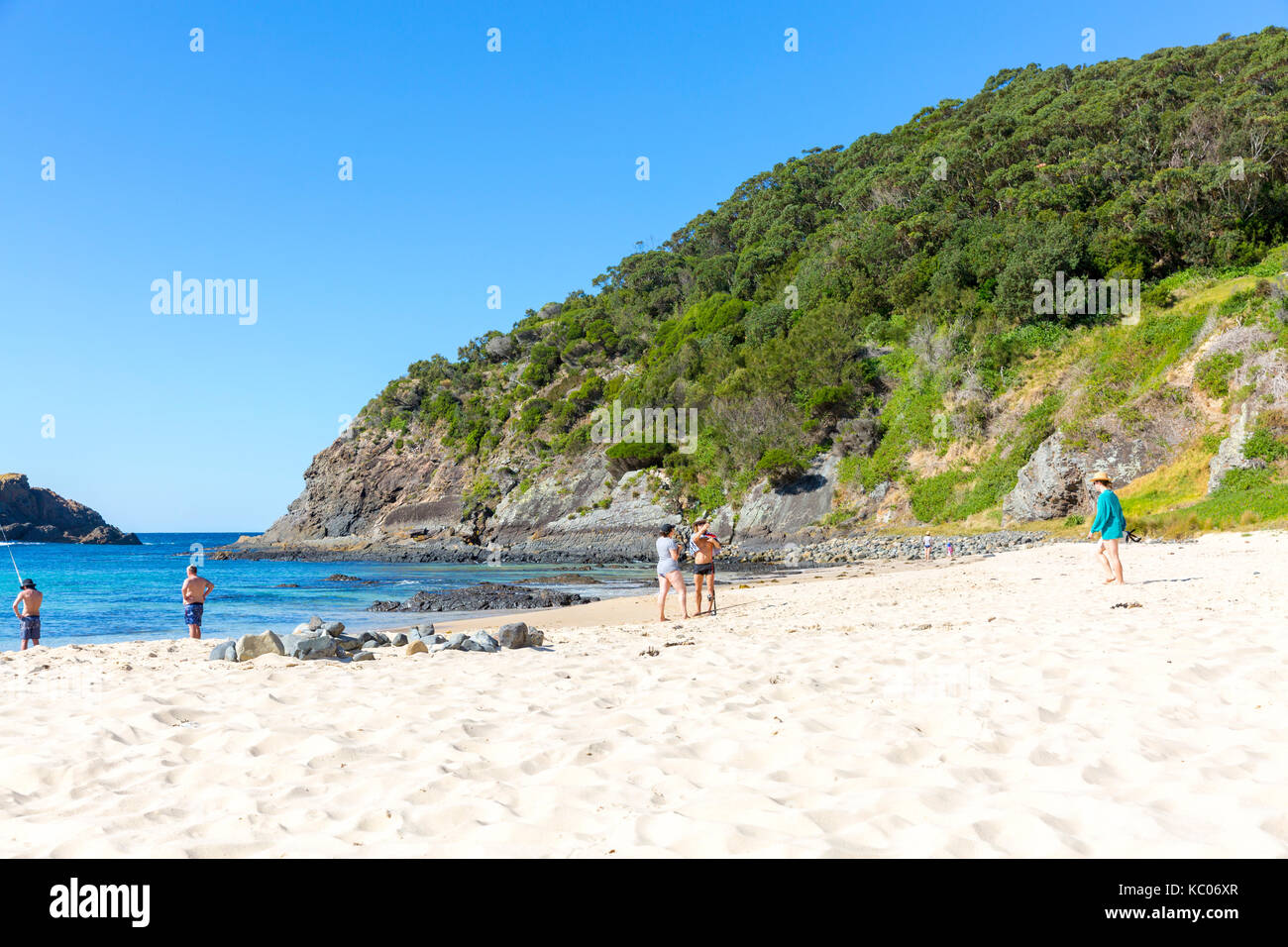 People on Boat Beach, one of the popular beaches at Seal Rocks on the ...
