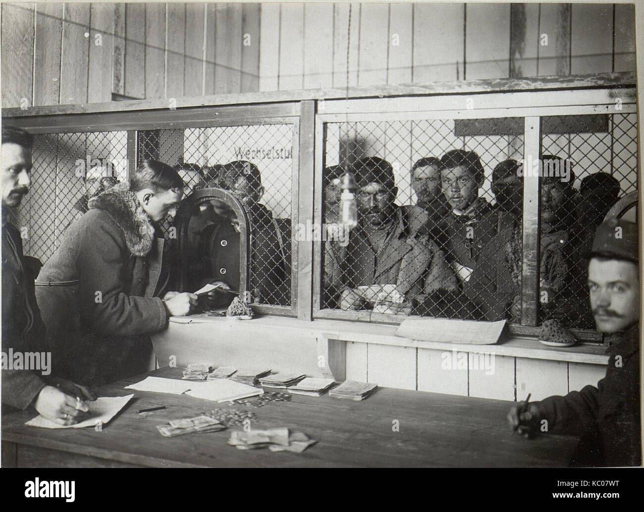 This historical illustration shows prisoners and soldiers returning ...