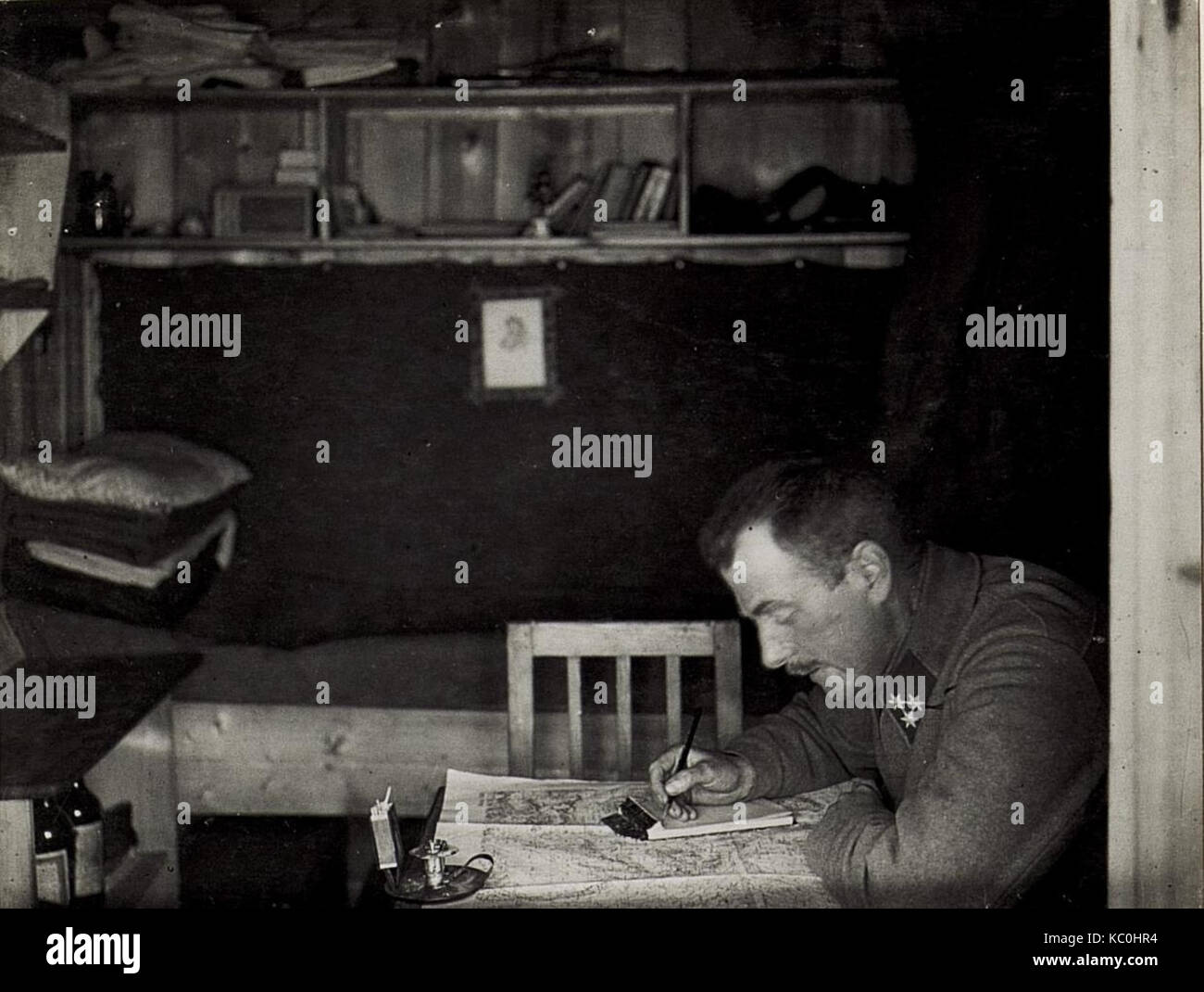 A photograph labeled 'Soldatenunterkunft,' depicting military barracks ...