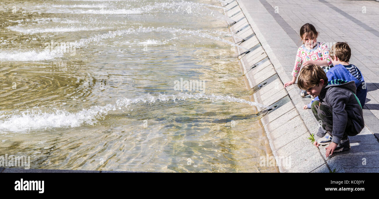 Children playing with water Stock Photo - Alamy