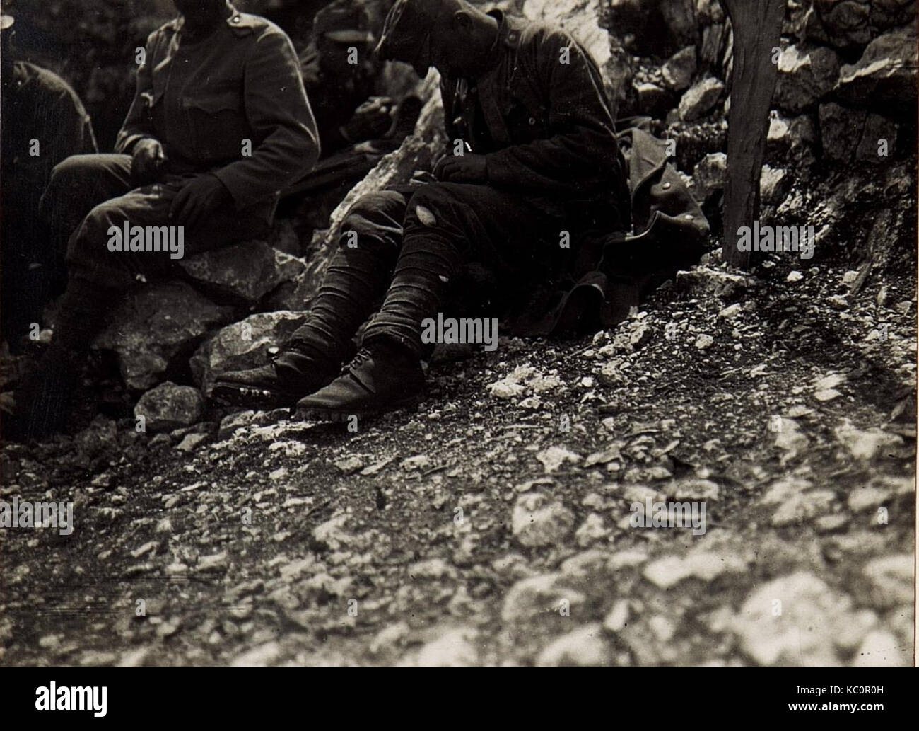A historical photograph showing a break during a military operation in ...