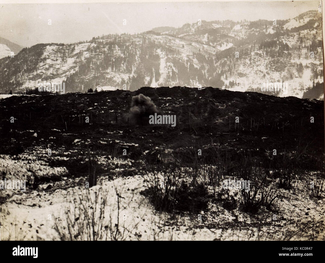 A historical military photograph depicting the use of explosives to ...