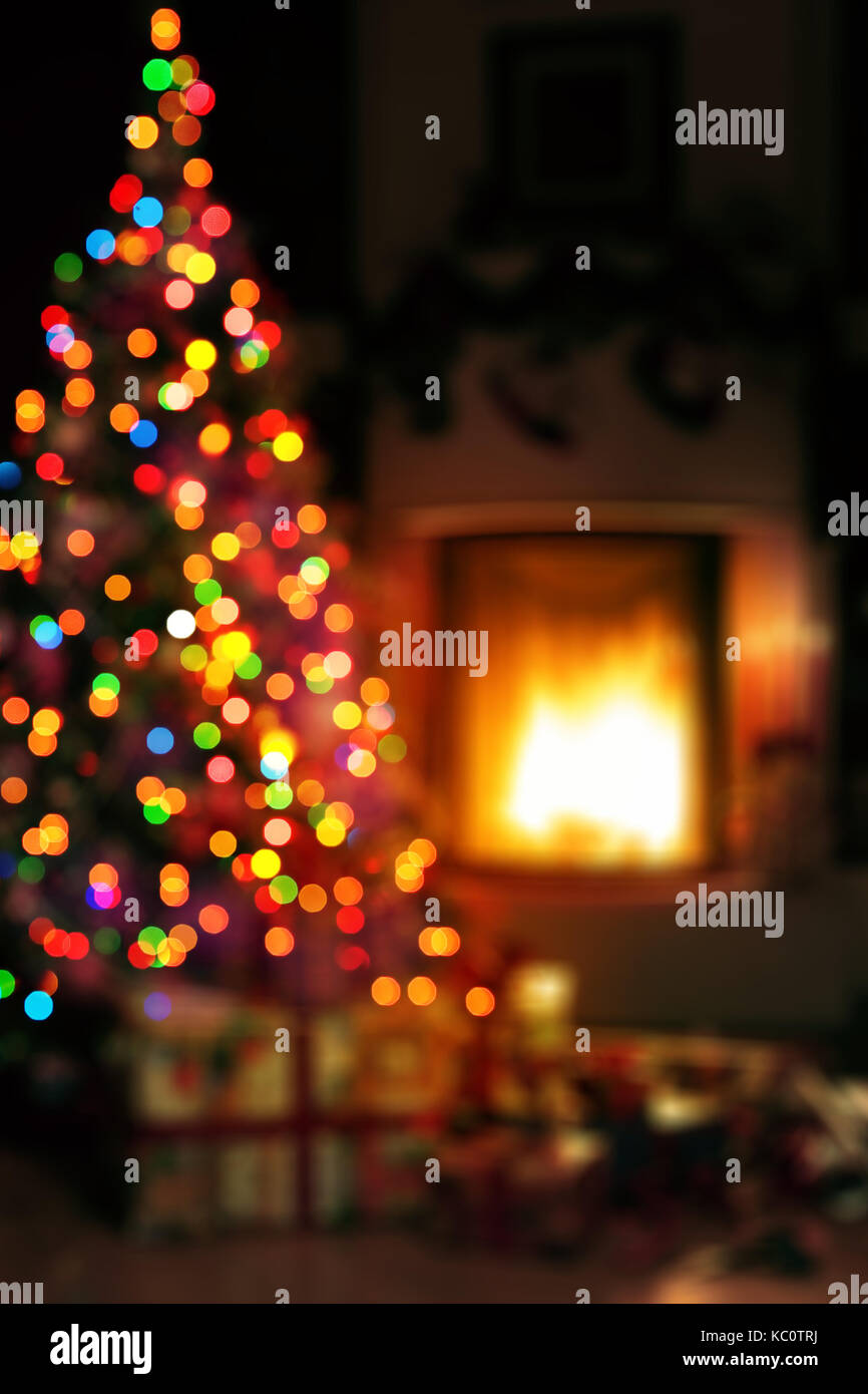 art Christmas scene with tree gifts and fire in background Stock Photo ...