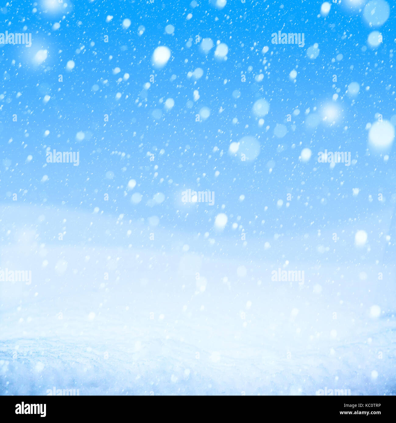 Art falling snow on the blue background Stock Photo - Alamy