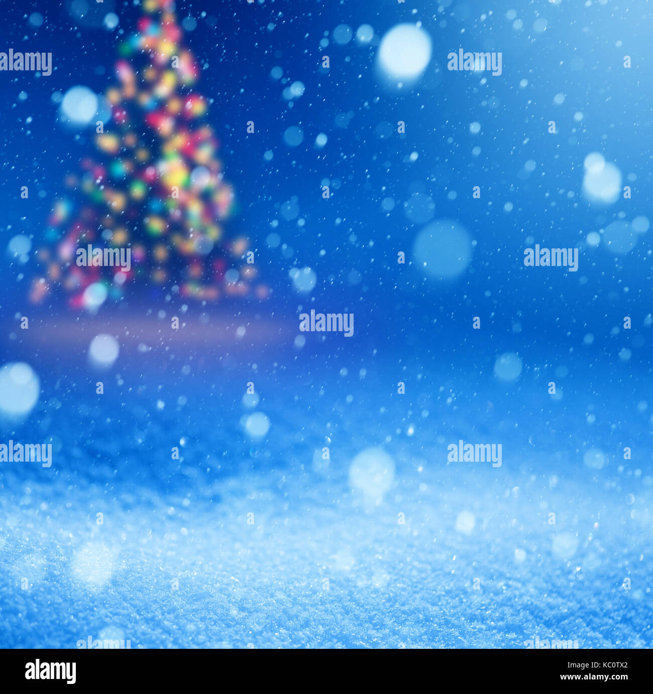 Art falling snow on the blue background Stock Photo - Alamy
