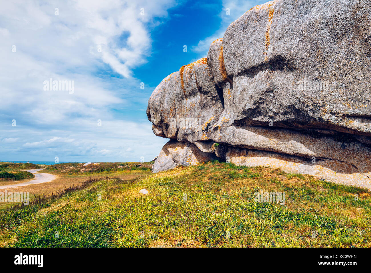 The pink granite rocks with strange shapes, coast in Brittany. The mass ...