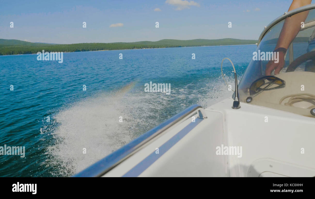 Wave foam splash that made form the boat's motor in lake. Waves and ...