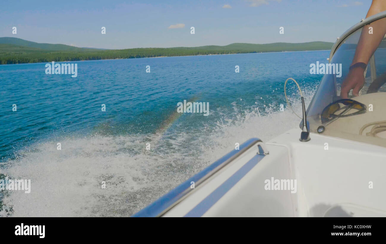 Wave foam splash that made form the boat's motor in lake. Waves and ...