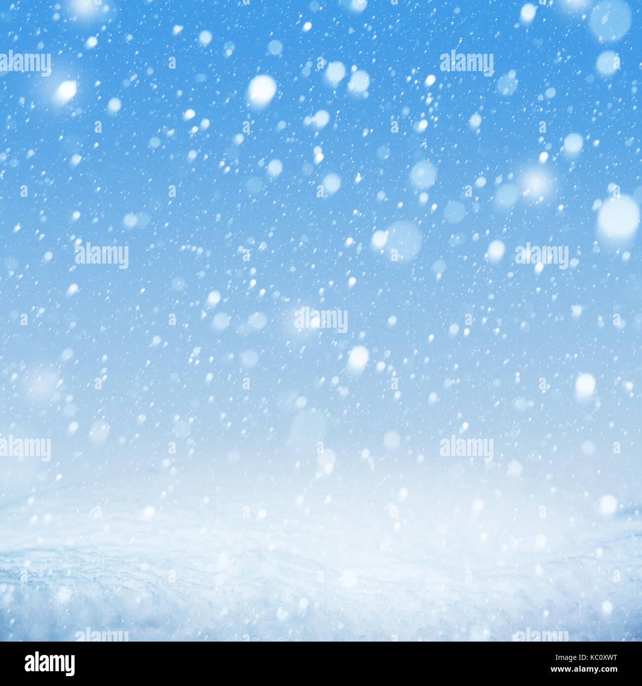 Art falling snow on the blue background Stock Photo - Alamy