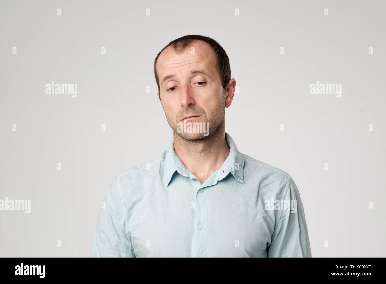 Sad face man hi-res stock photography and images - Alamy