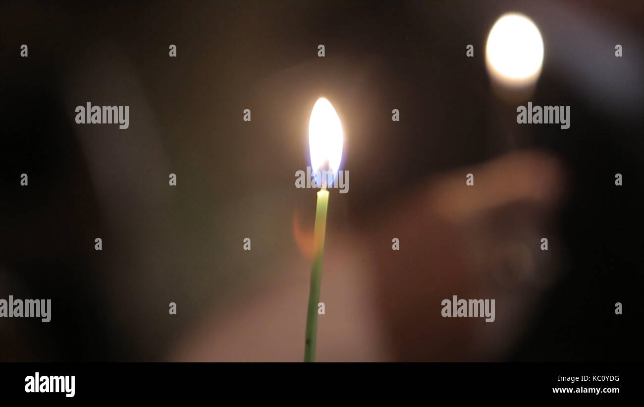 Lighting A Candle With A Match To Get A Romantic Candlelight. Amazing ...