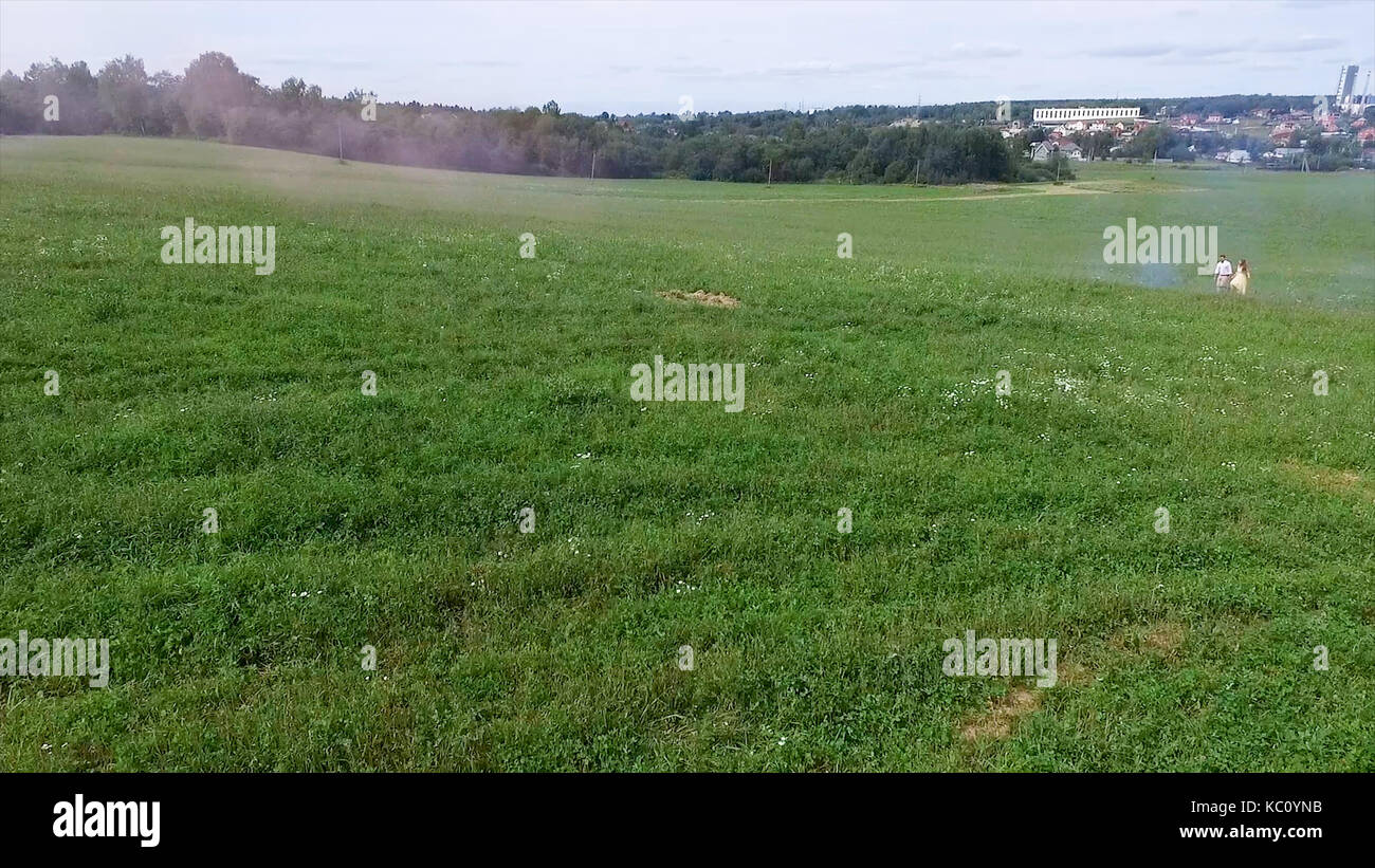 Aerial survey couple walk hi-res stock photography and images - Alamy