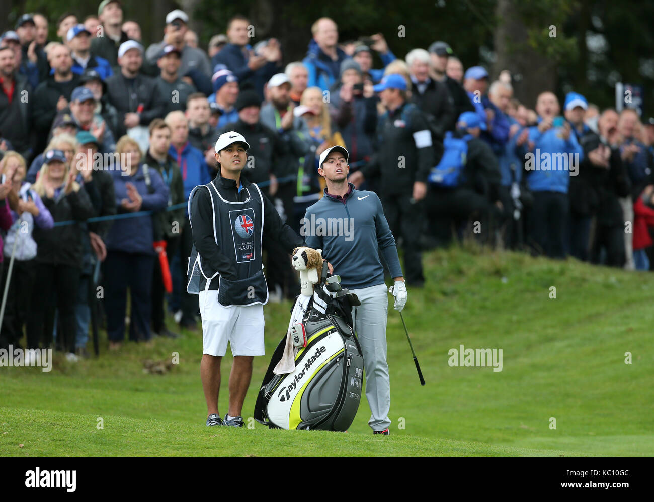 Northern Ireland's Rory McIlroy with caddie Harry Diamond during day ...