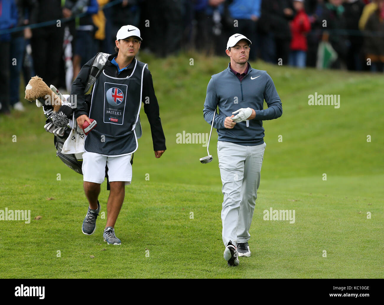 Northern Ireland's Rory McIlroy with caddie Harry Diamond during day ...