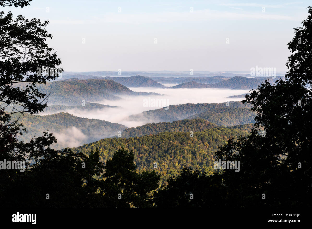 Morning fog hovers above the valleys in Central Appalachia Stock Photo ...