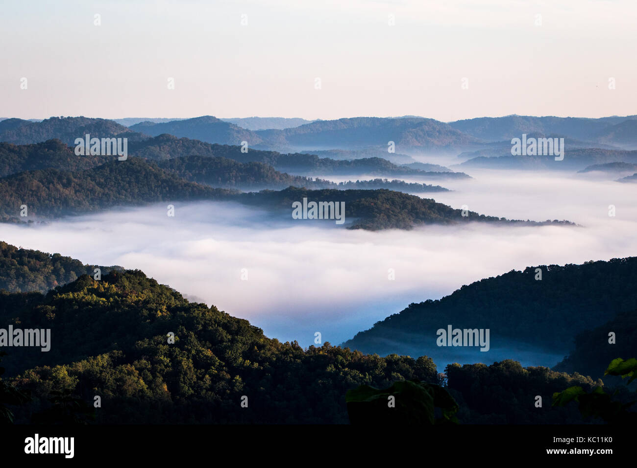 Morning fog hovers above the valleys in Central Appalachia Stock Photo ...