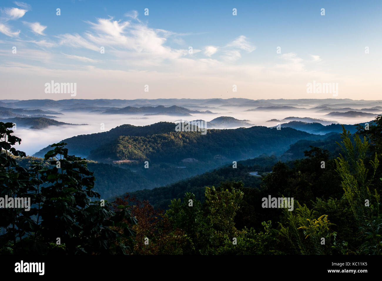 Morning fog hovers above the valleys in Central Appalachia Stock Photo ...