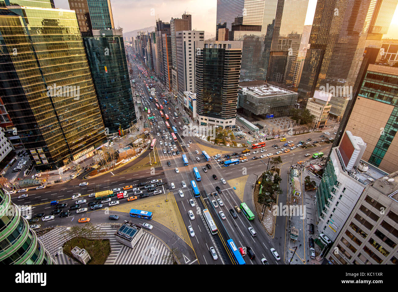 Traffic speeds through an intersection in Gangnam, Seoul in South Korea ...