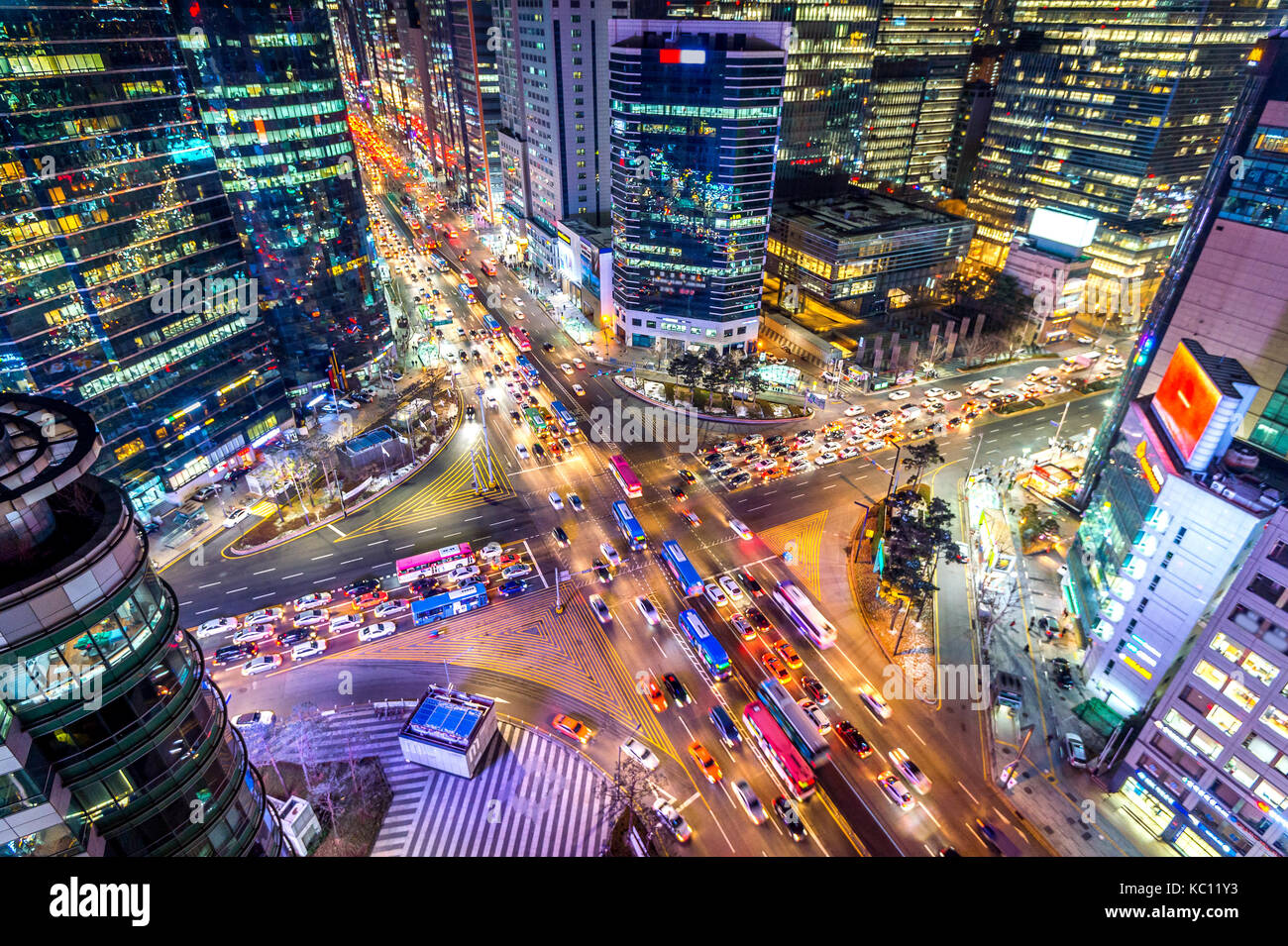 Traffic speeds through an intersection at night in Gangnam, Seoul in South Korea Stock Photo - Alamy