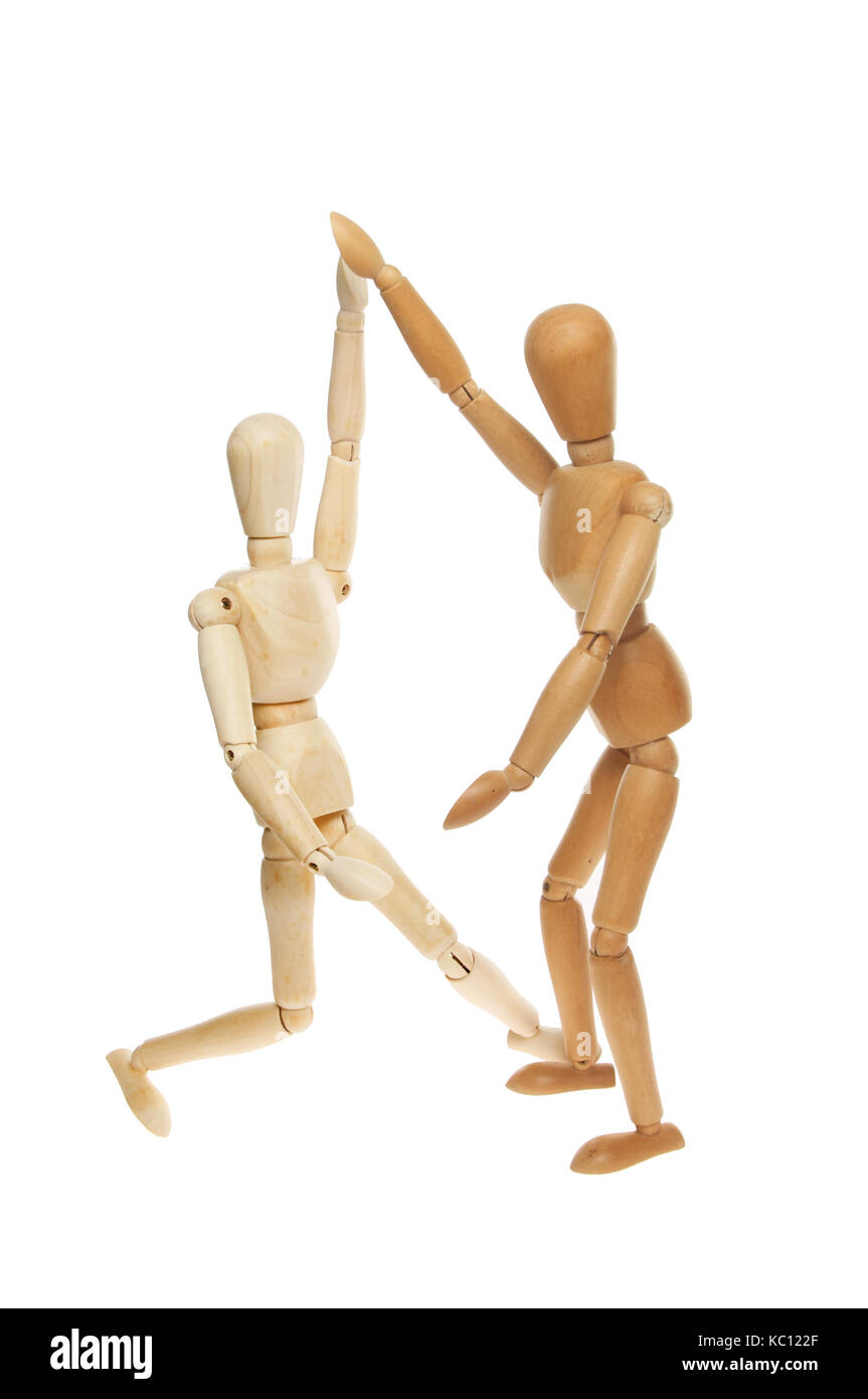 Two wooden artist's manikins dancing isolated against white Stock Photo ...