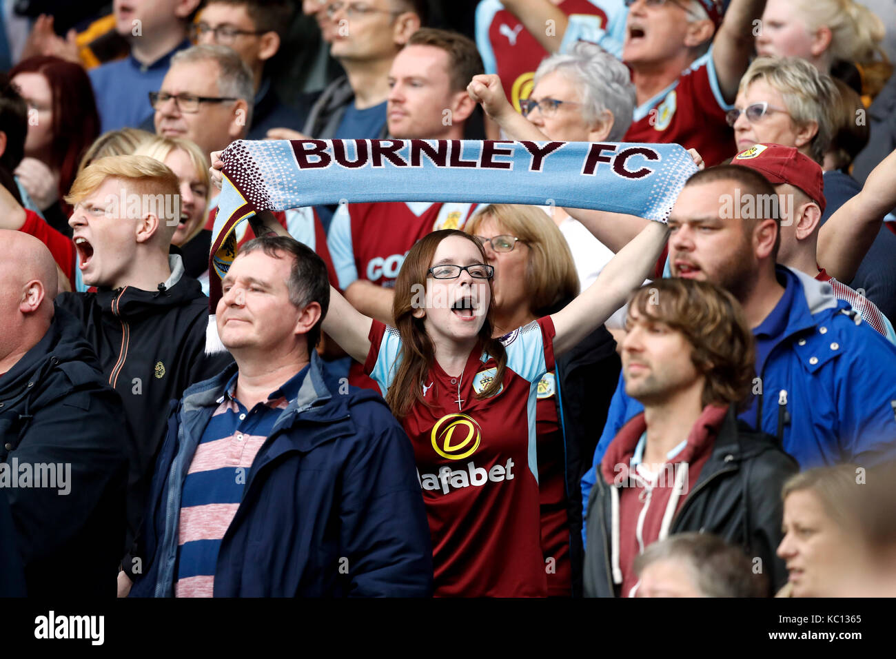 Burnley fans in the stands Stock Photo - Alamy