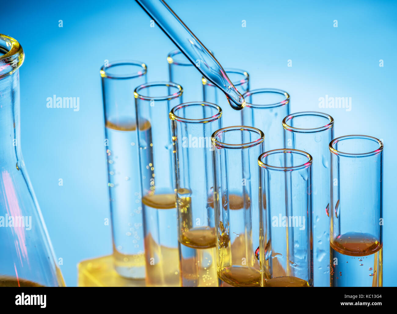 Different laboratory beakers and glassware. Multicolored Stock Photo ...