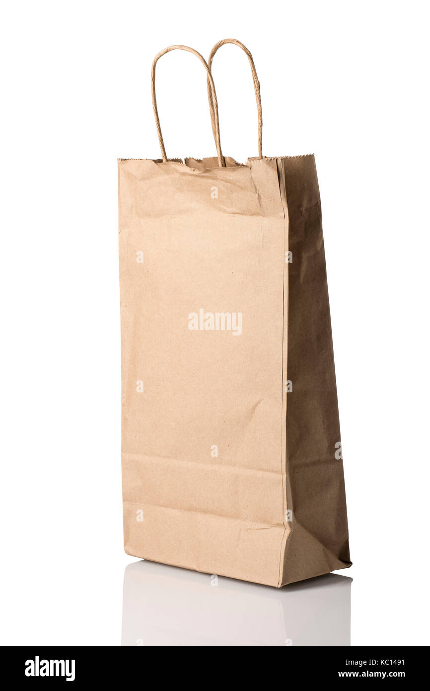 A brown paper bag, possibly for alcohol, angled and isolated on white ...
