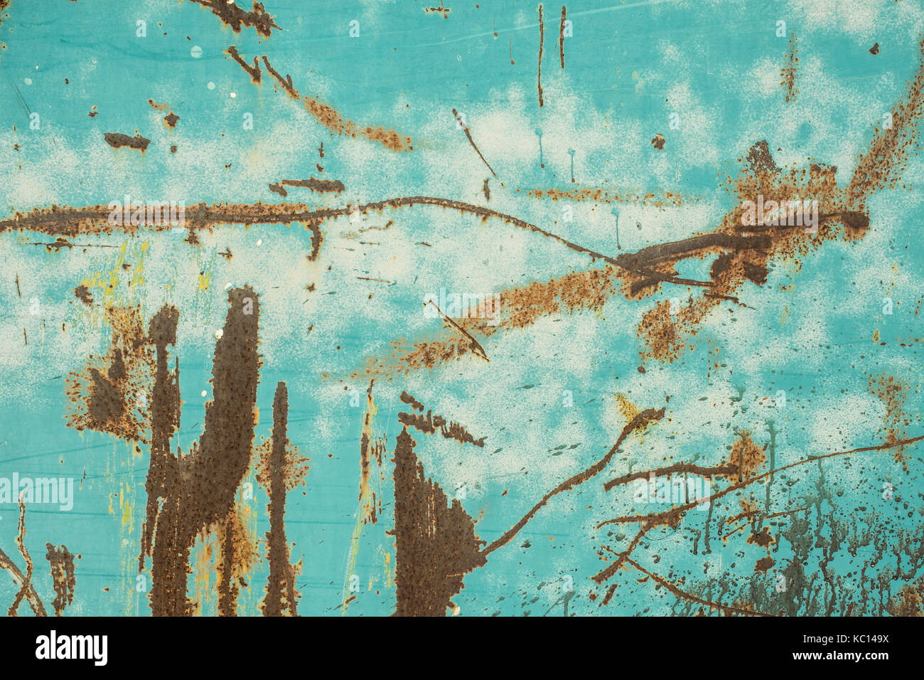 An old, grungy, turquoise metal surface with rust spots, scratches, and ...