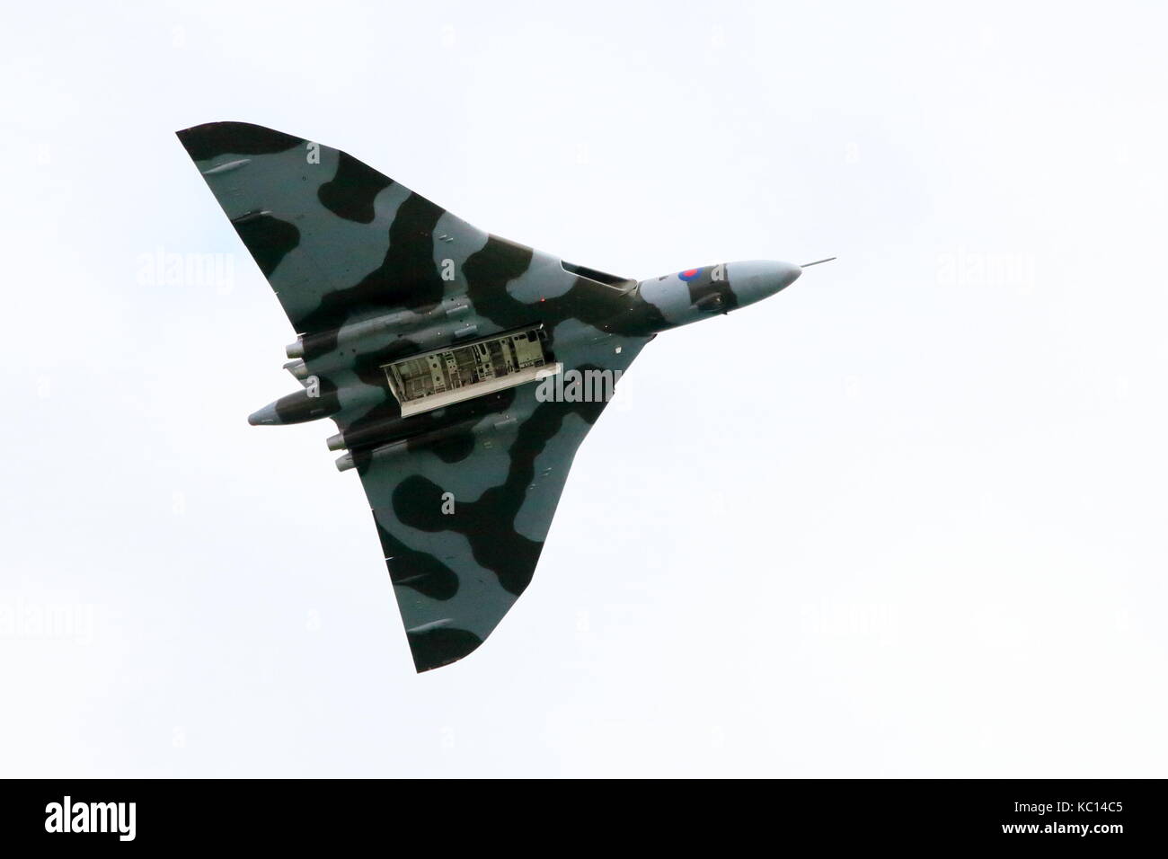 Royal Air Force Avro Vulcan delta wing aircraft slow flypast with bomb ...