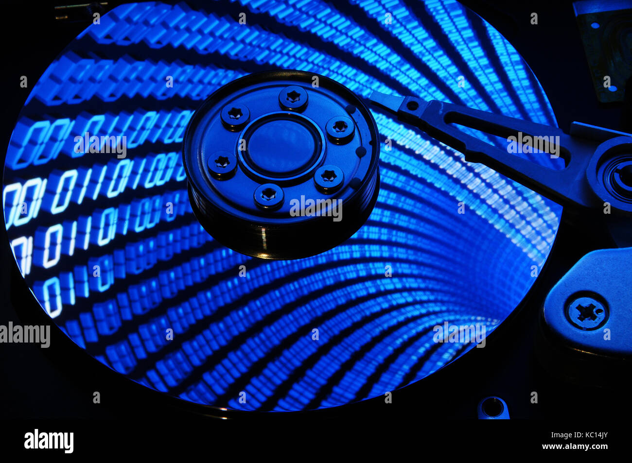 close up of open hard disk with binary effects Stock Photo - Alamy