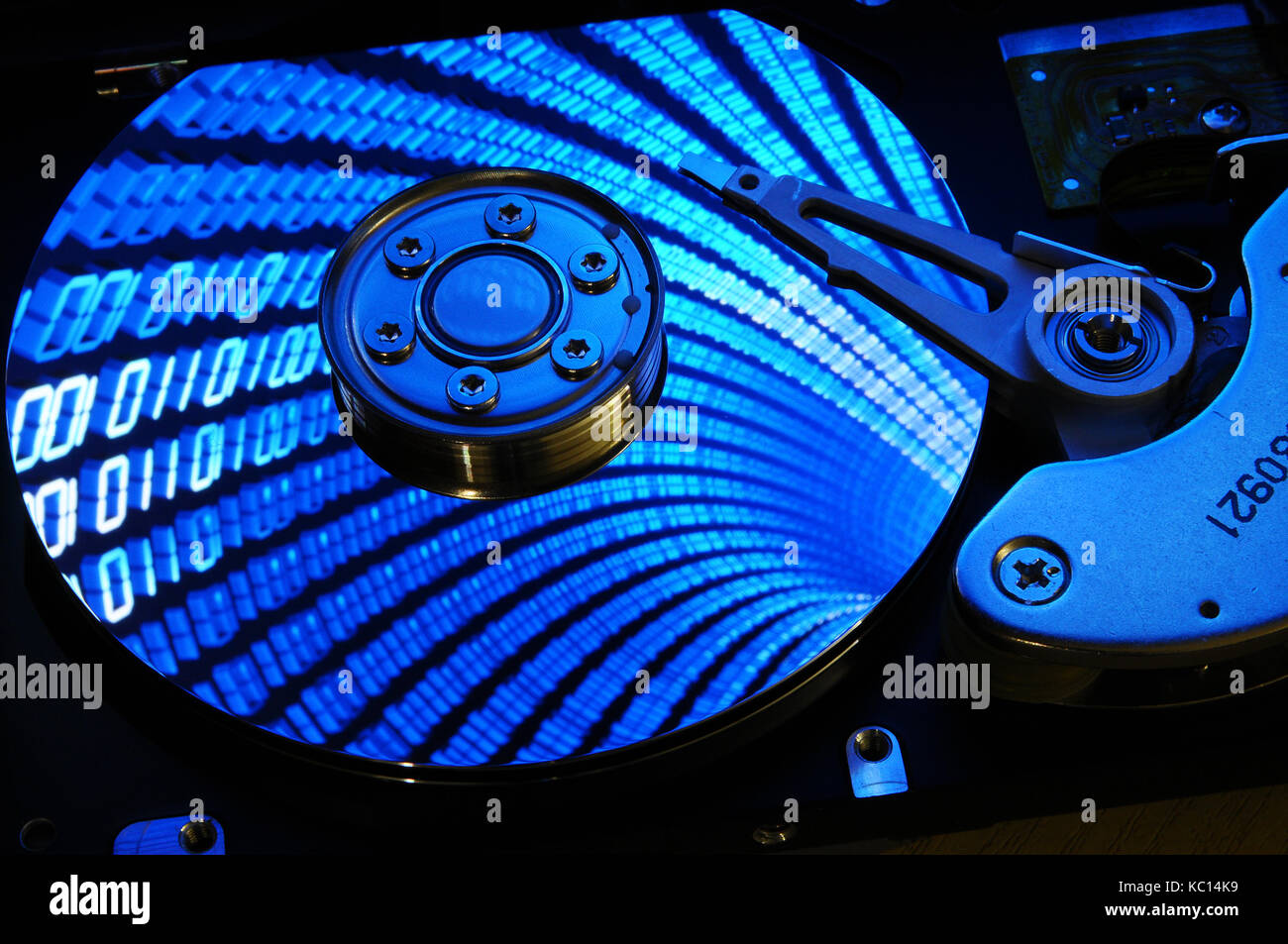 close up of open hard disk with binary effects Stock Photo - Alamy