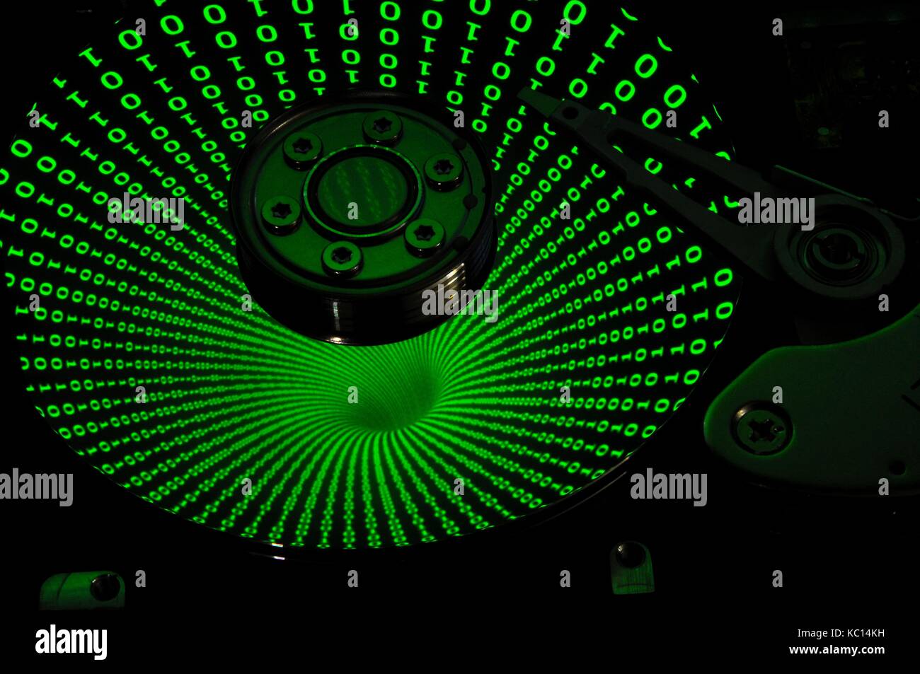 close up of open hard disk with binary effects Stock Photo - Alamy