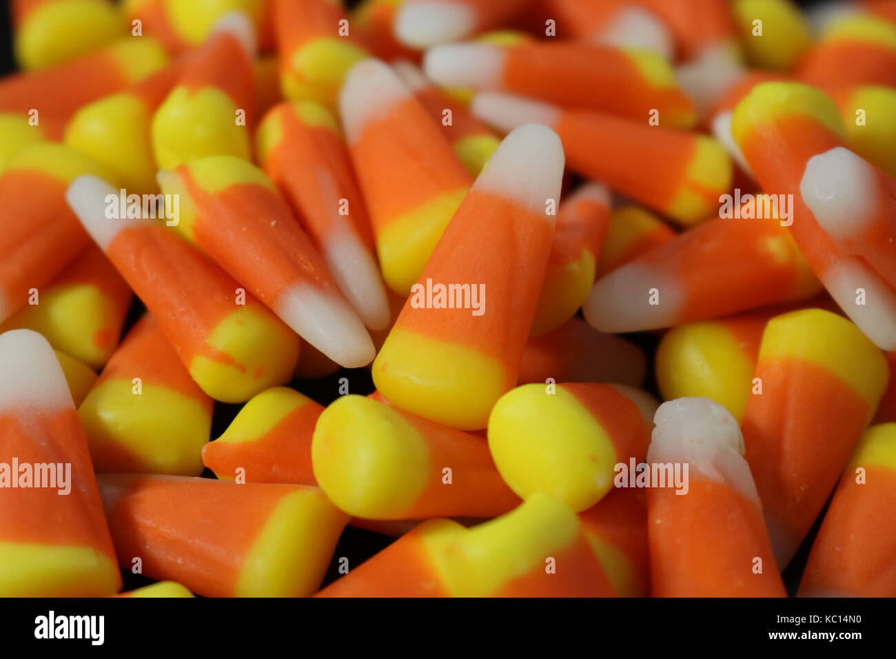 Close up of a pile of candy corn Stock Photo - Alamy