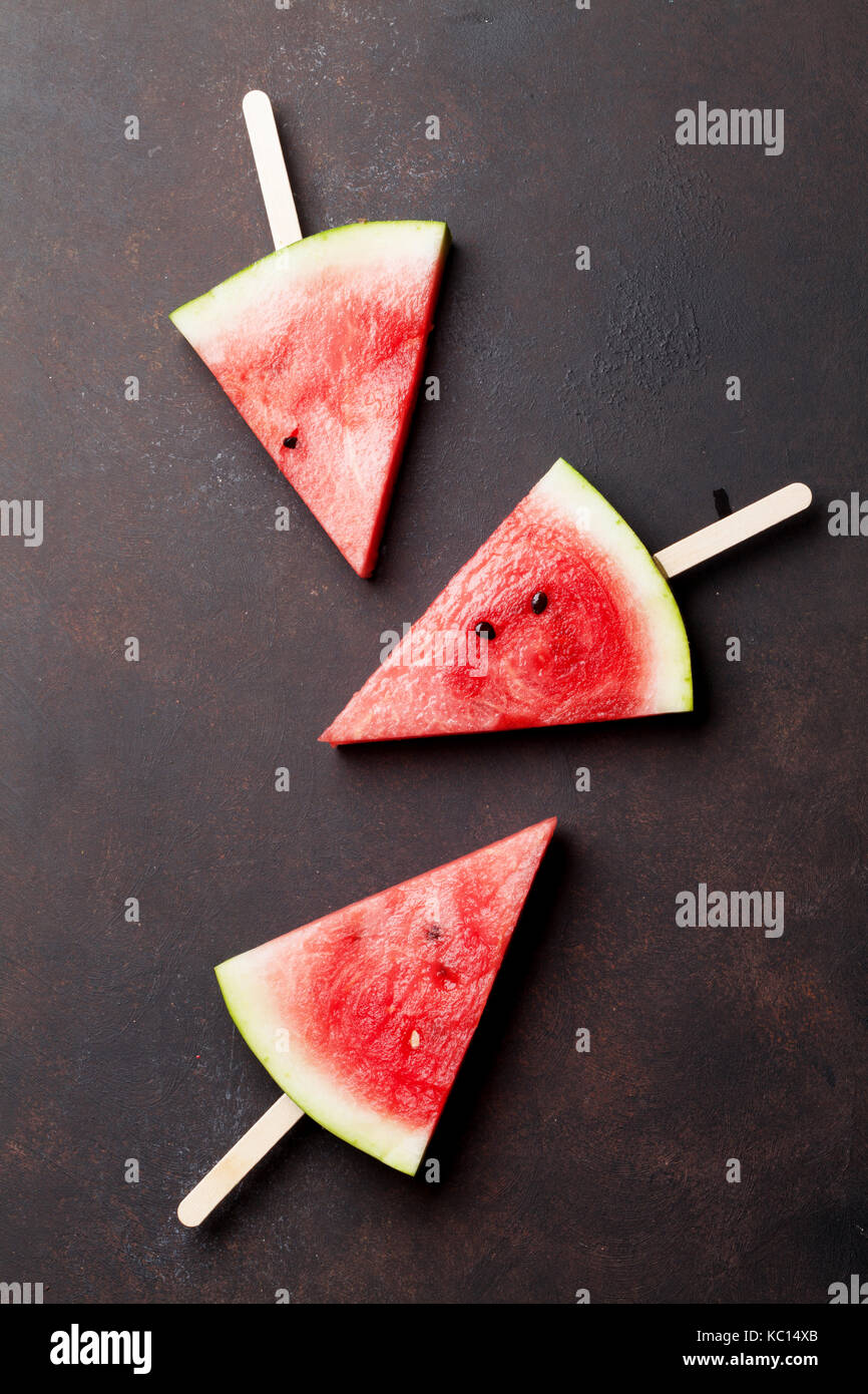 Fresh watermelon slices on stone background. Top view Stock Photo - Alamy