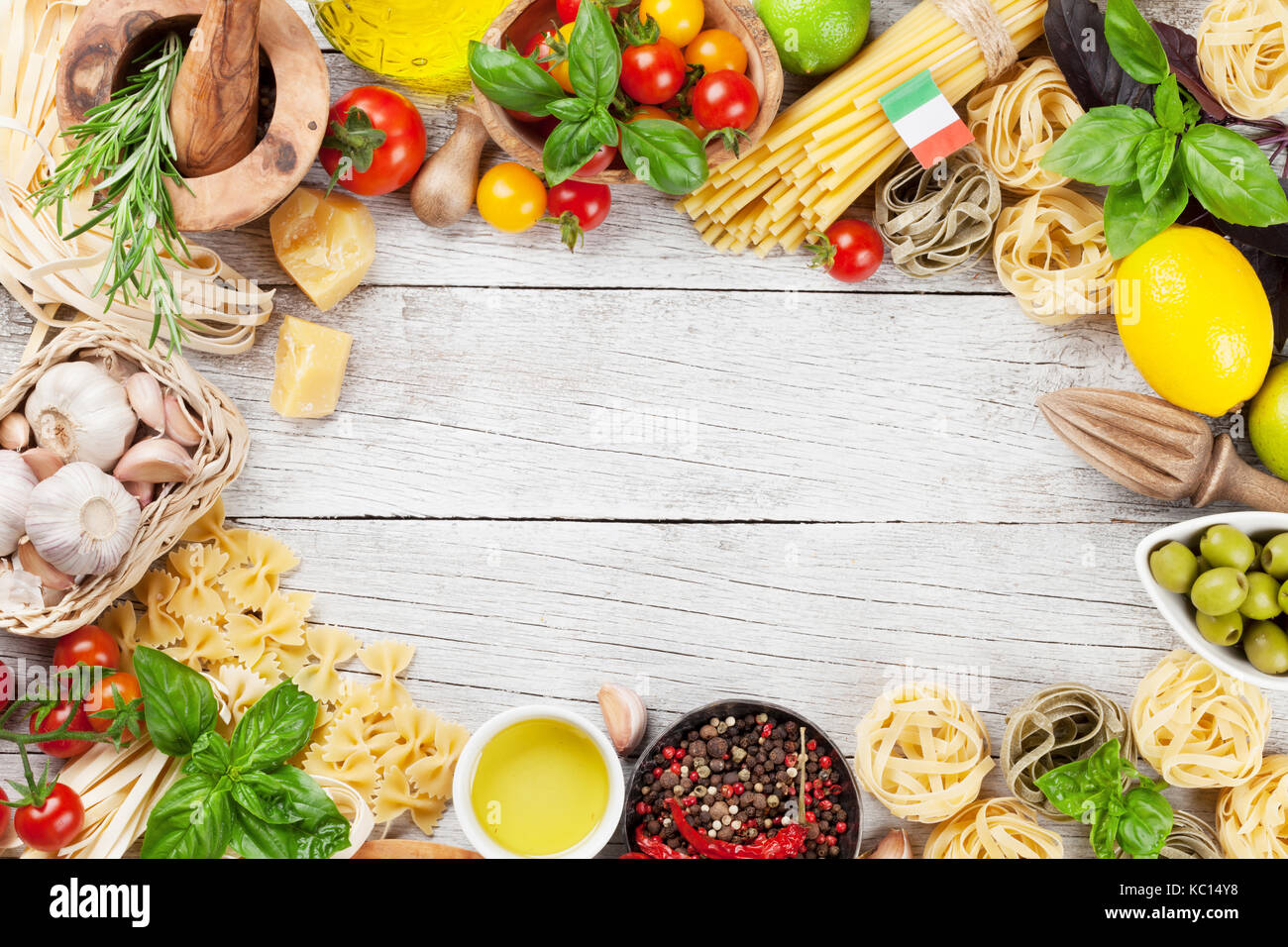 Italian food. Pasta ingredients on wooden table. Top view with space ...